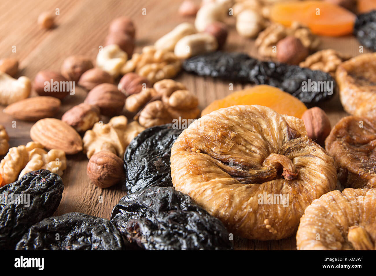 Dried fruits and nuts: prunes, apricots, figs, hazelnuts, almond ...
