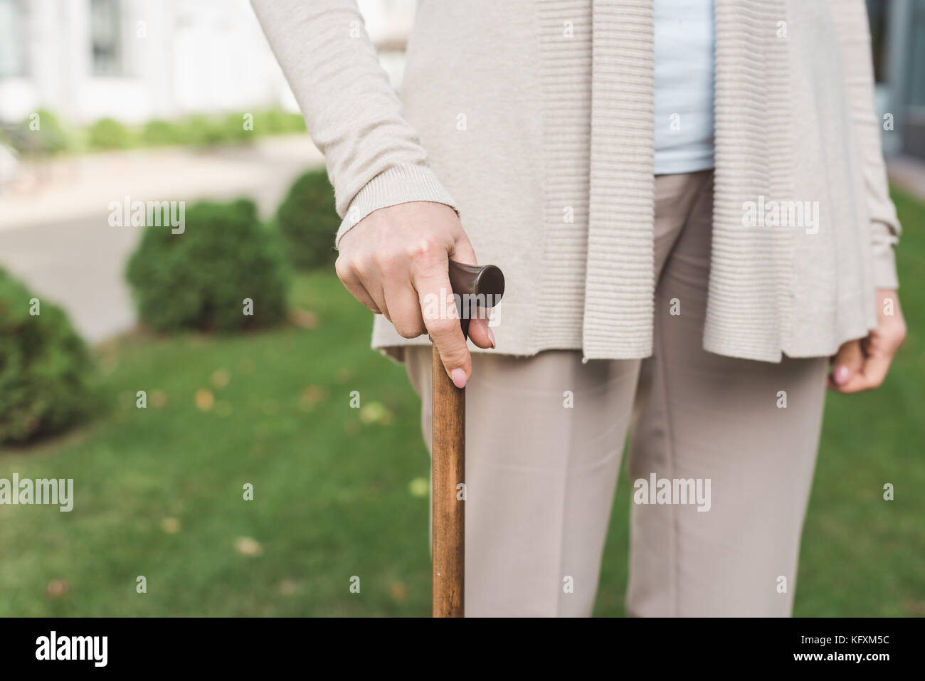 senior woman with cane Stock Photo - Alamy