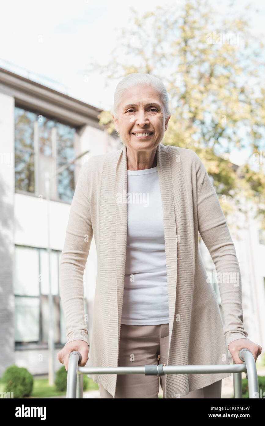 senior woman with walker Stock Photo - Alamy