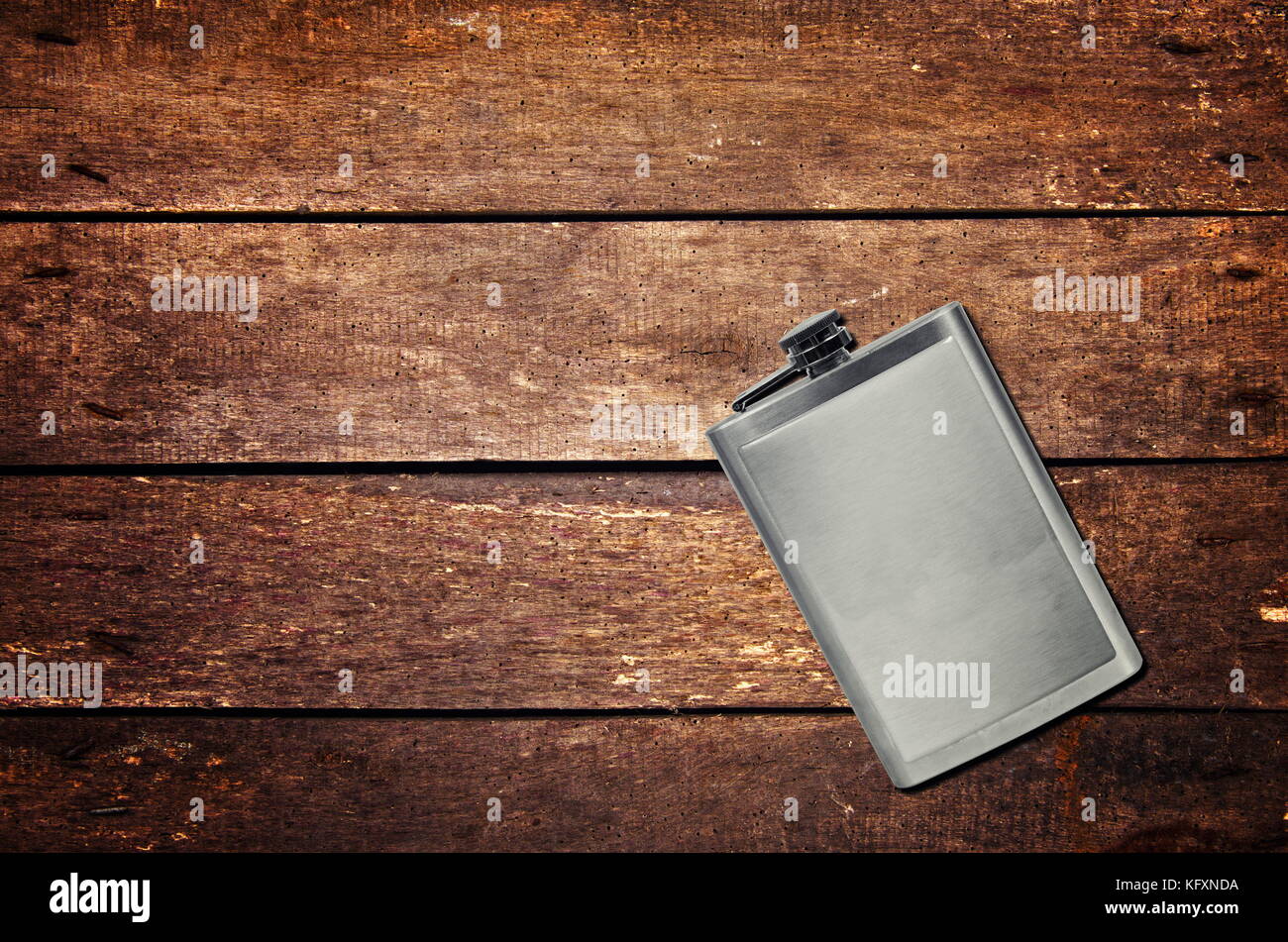 Alcohol flask on the table Stock Photo - Alamy