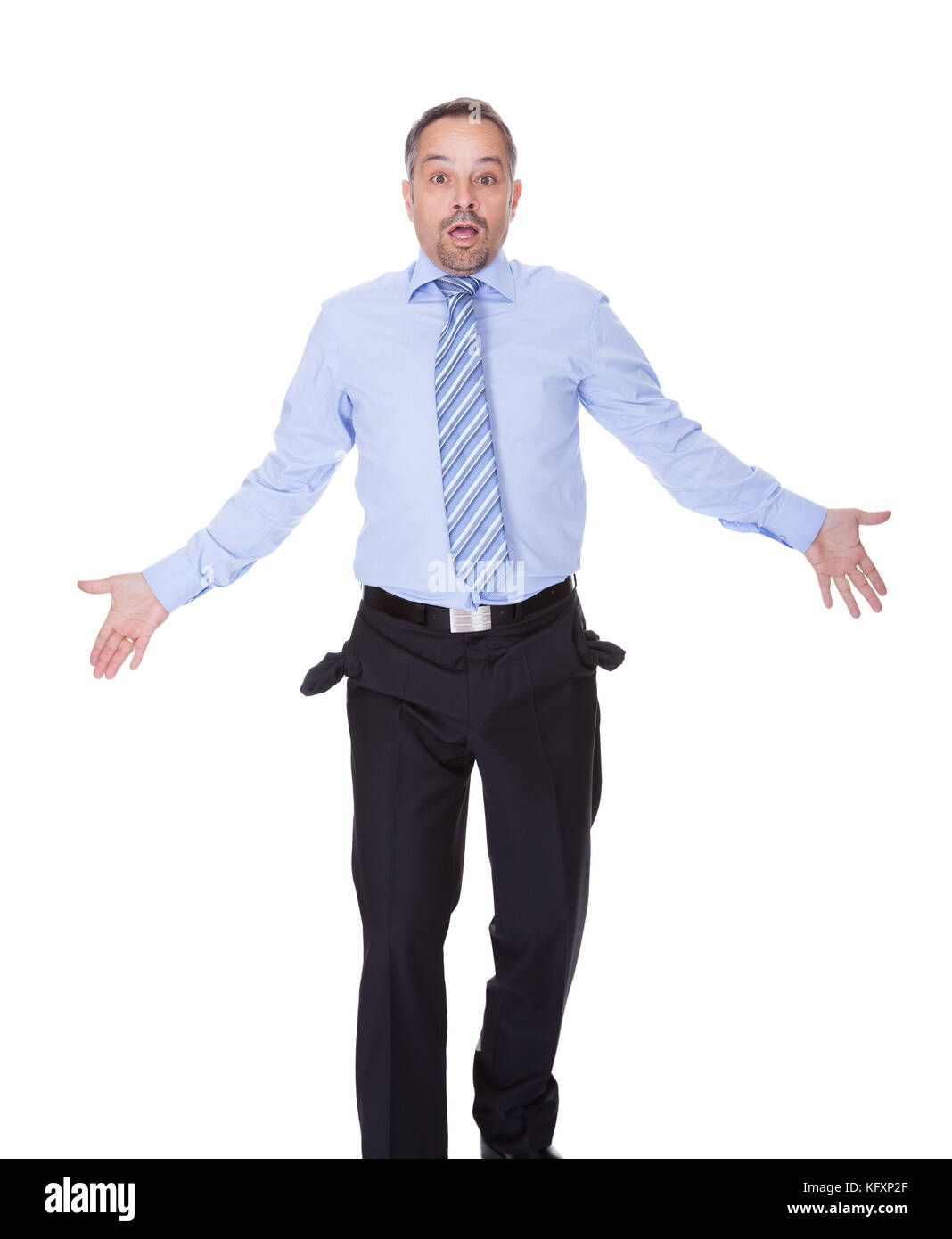 Businessman Showing Empty Pockets On White Backgrounds Stock Photo - Alamy