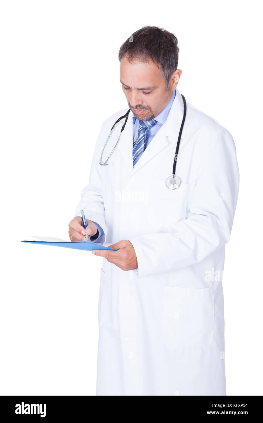 Portrait Of Happy Doctor Writing On Paper Stock Photo - Alamy