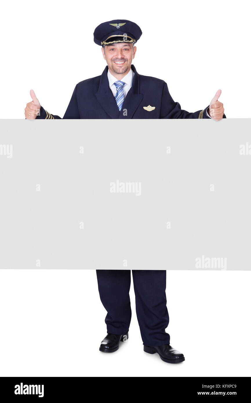 Portrait Of Happy Pilot Holding Blank Placard On White Background Stock ...