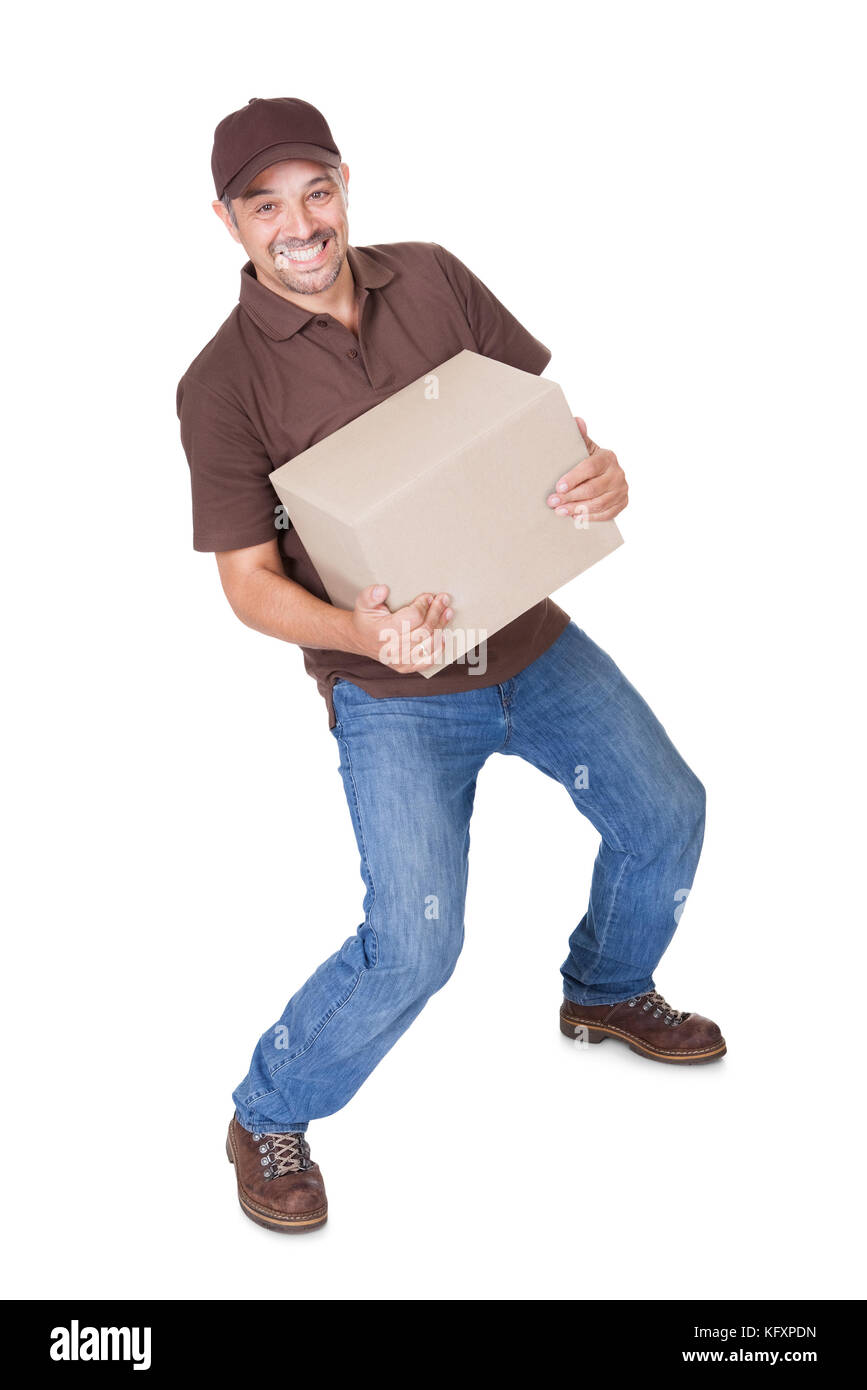 Man carrying heavy box isolated hi-res stock photography and images - Alamy