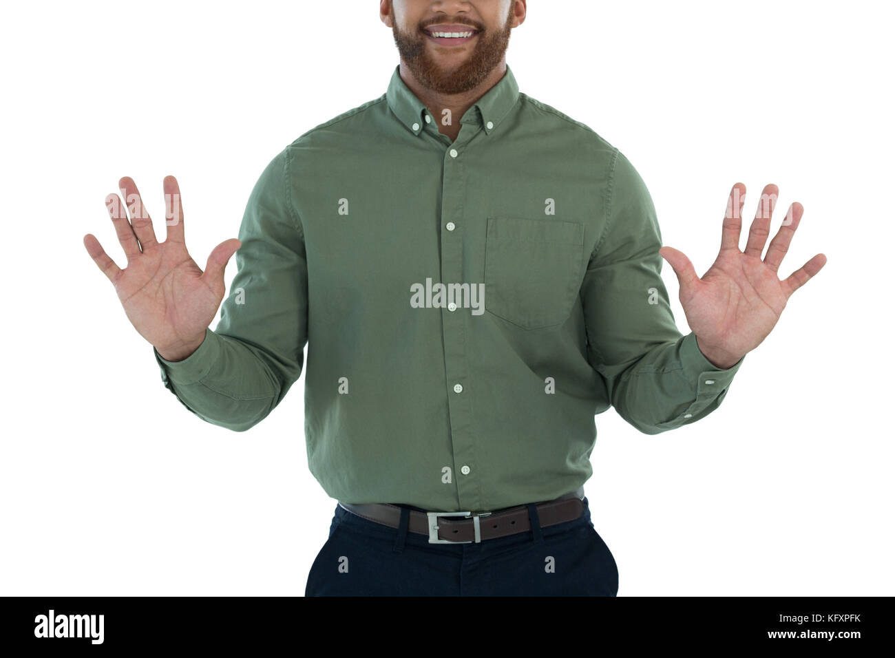 Mid-section of male executive pretending to use an invisible screen ...