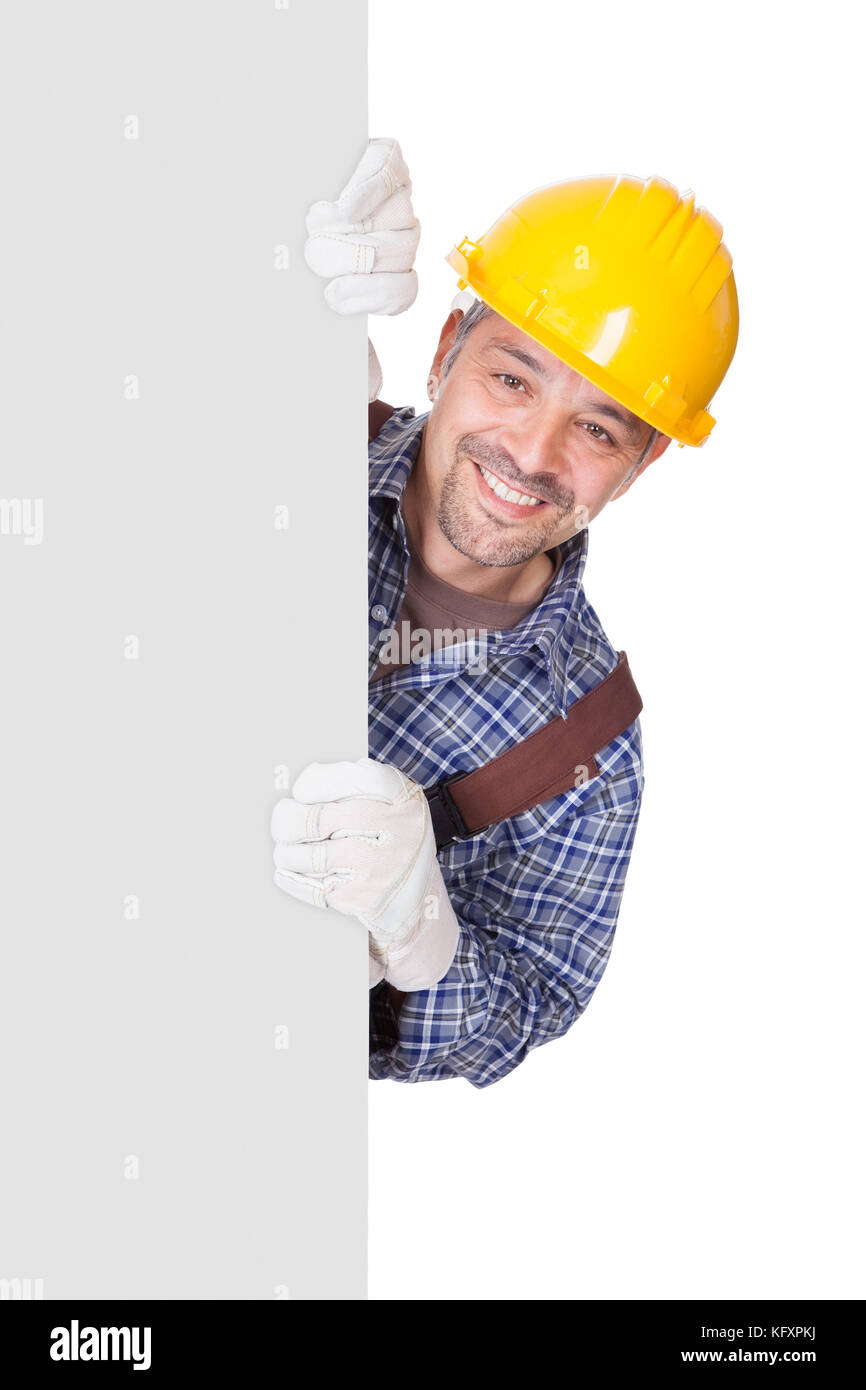 Portrait Of Happy Contractor Holding Placard On White Background Stock ...