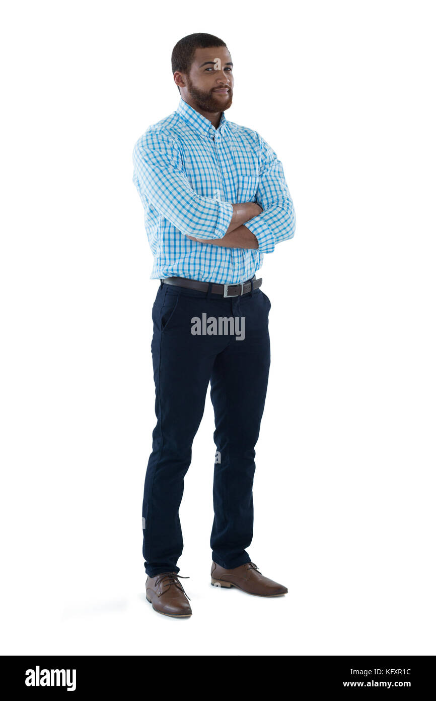 Young male executive posing against white background Stock Photo - Alamy