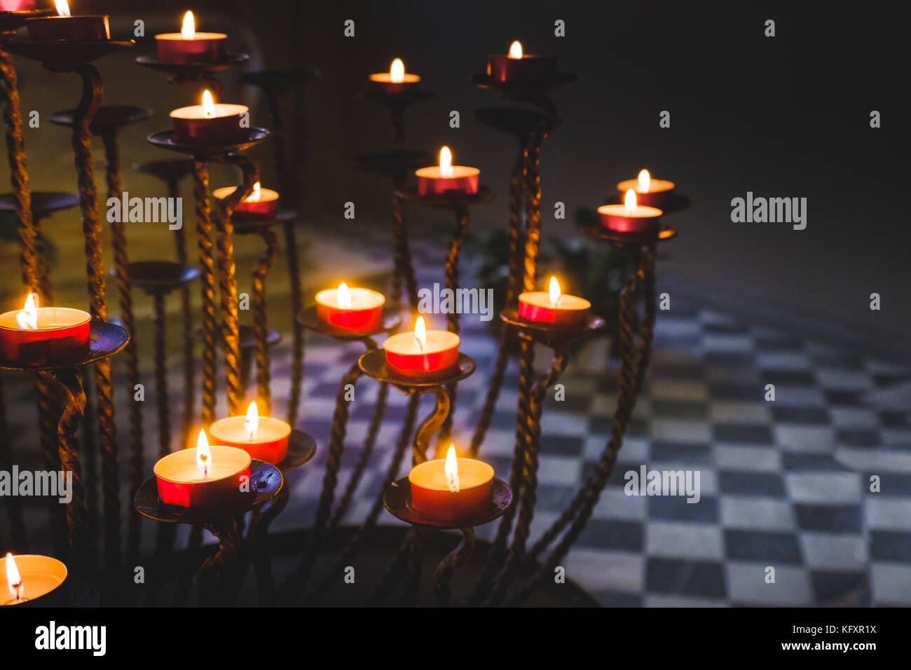 little candles candlestick dark background Stock Photo - Alamy
