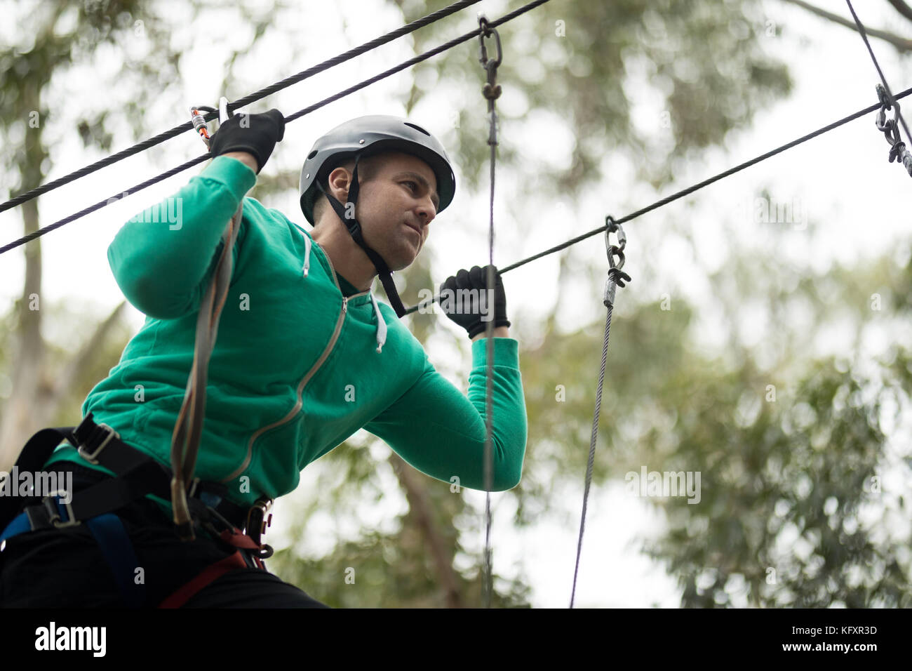 Adult man on zip line hi-res stock photography and images - Alamy