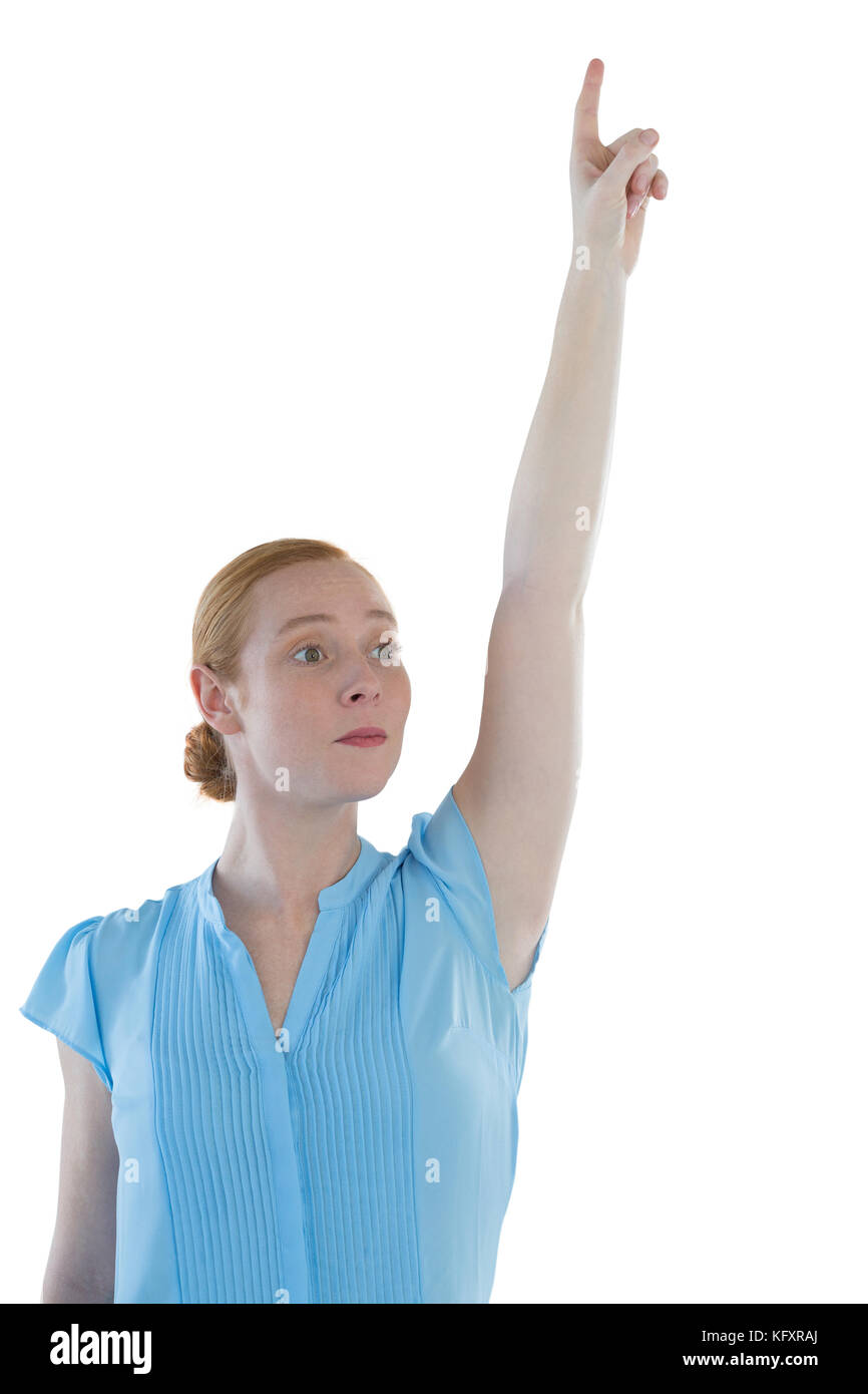 Young female executive raising hand against white background Stock ...