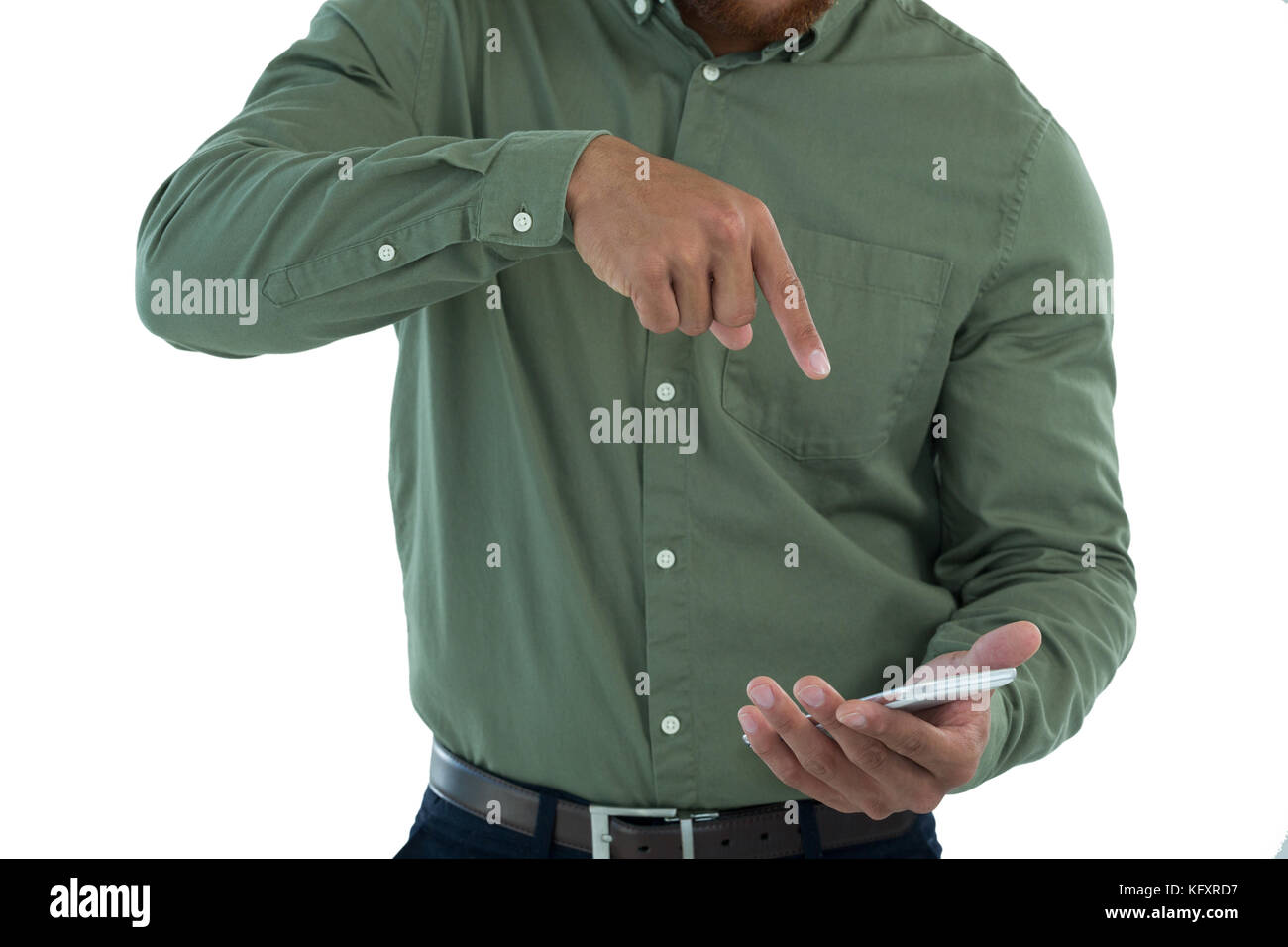 Mid-section of male executive pretending to use an invisible screen ...