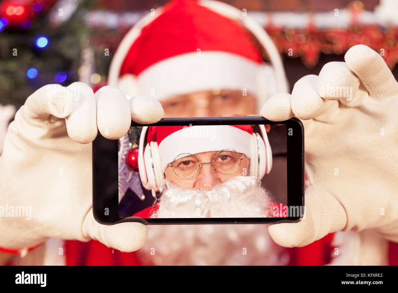 santa claus take a selfie with smart phone Stock Photo - Alamy