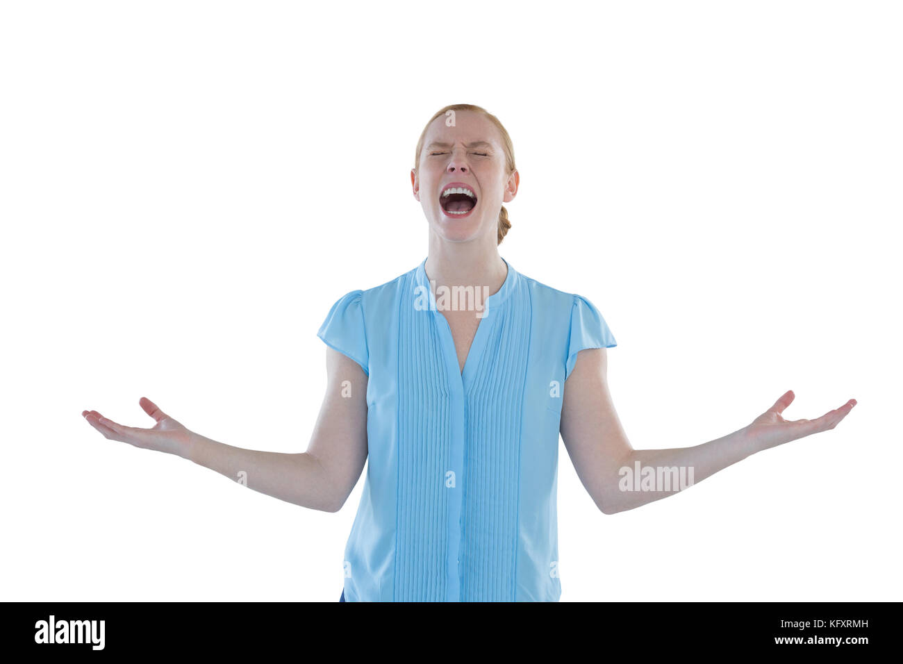 Angry female executive shouting against white background Stock Photo ...