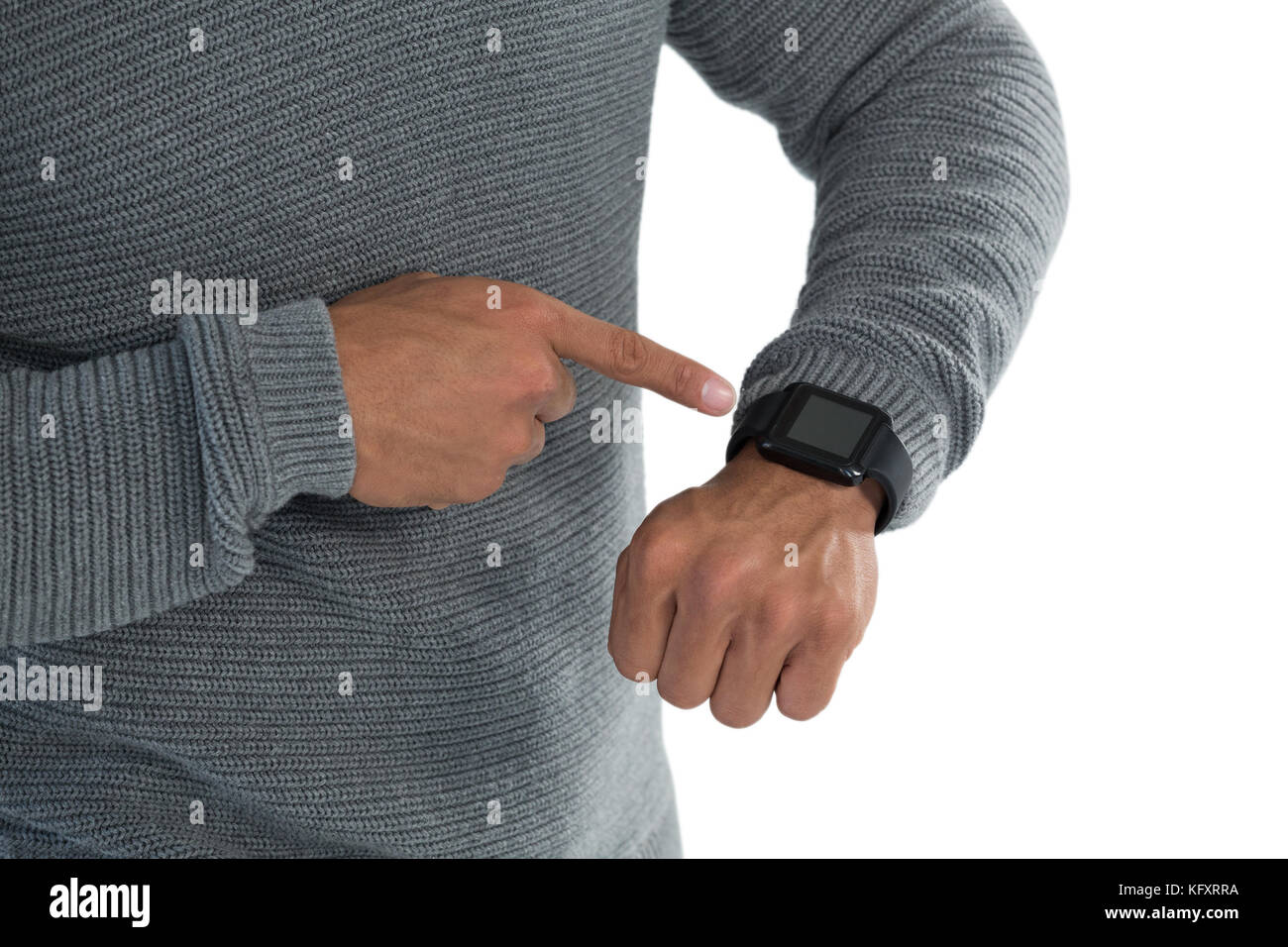 Mid-section of male executive pointing towards his smartwatch Stock ...