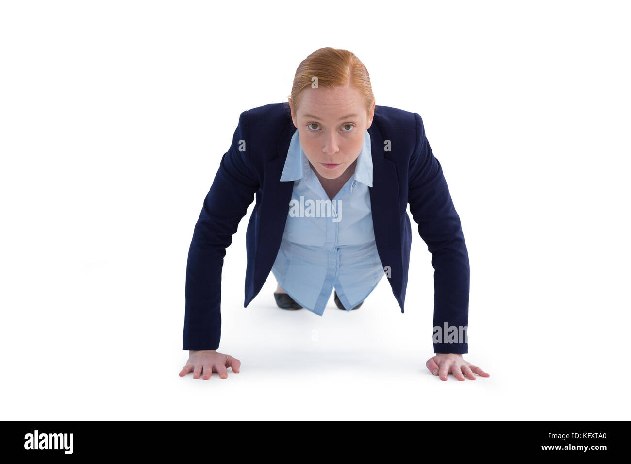 Businesswoman performing push ups against white background Stock Photo ...