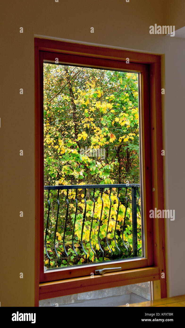 Autumn view through a wooden window Stock Photo - Alamy