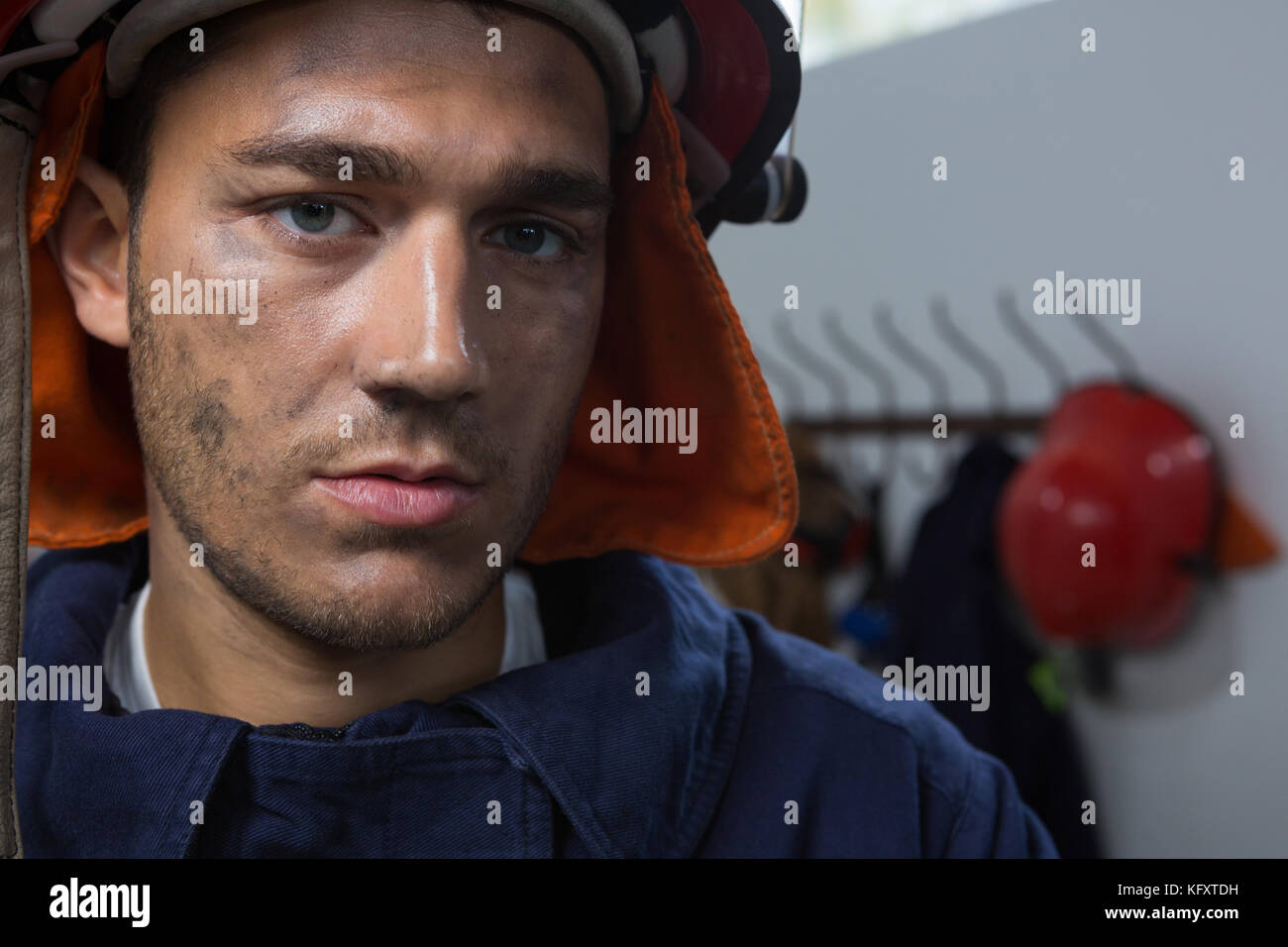 Close-up of fireman in the office, portrait Stock Photo - Alamy