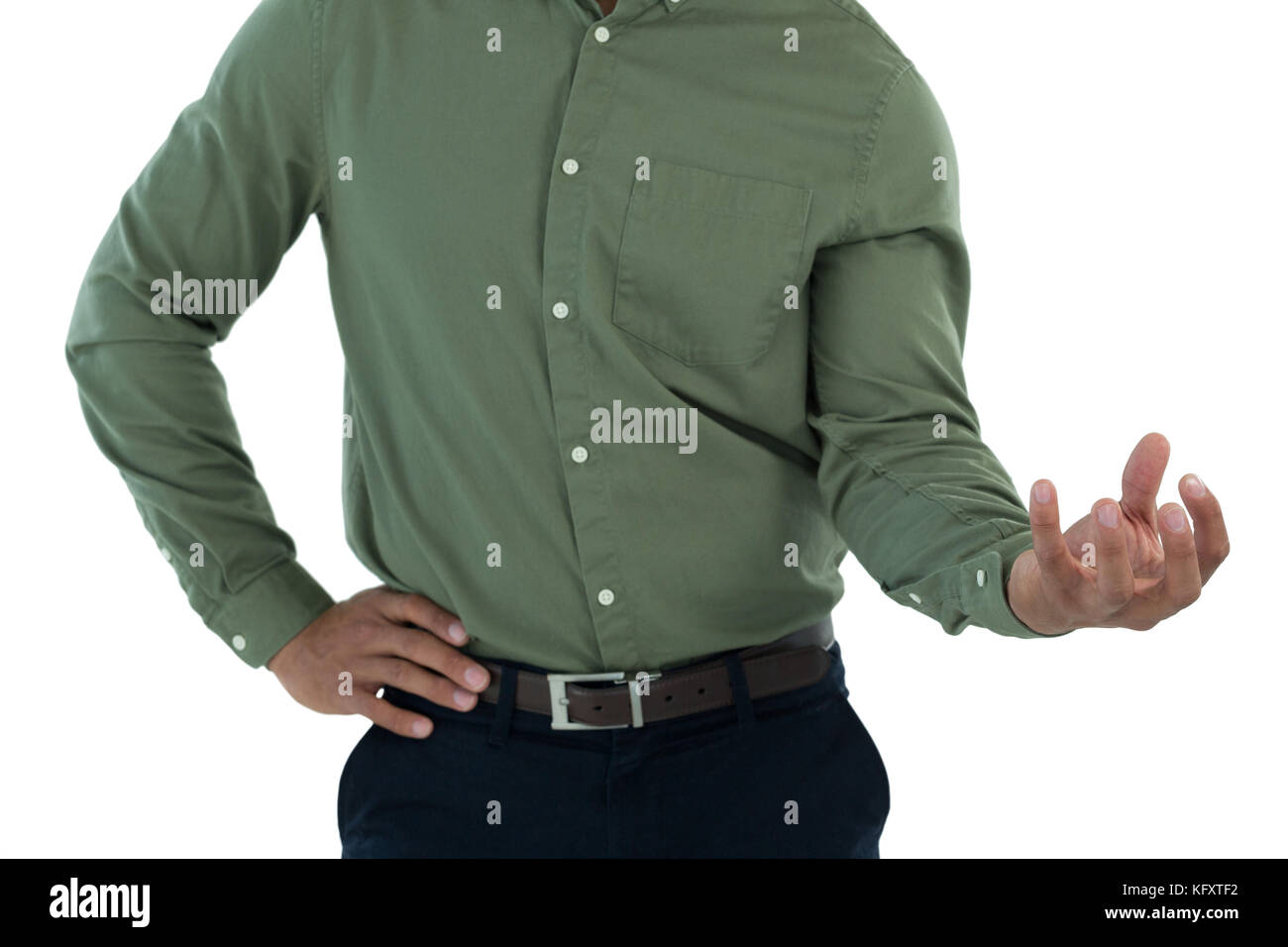 Mid-section of male executive pretending to hold an invisible object ...