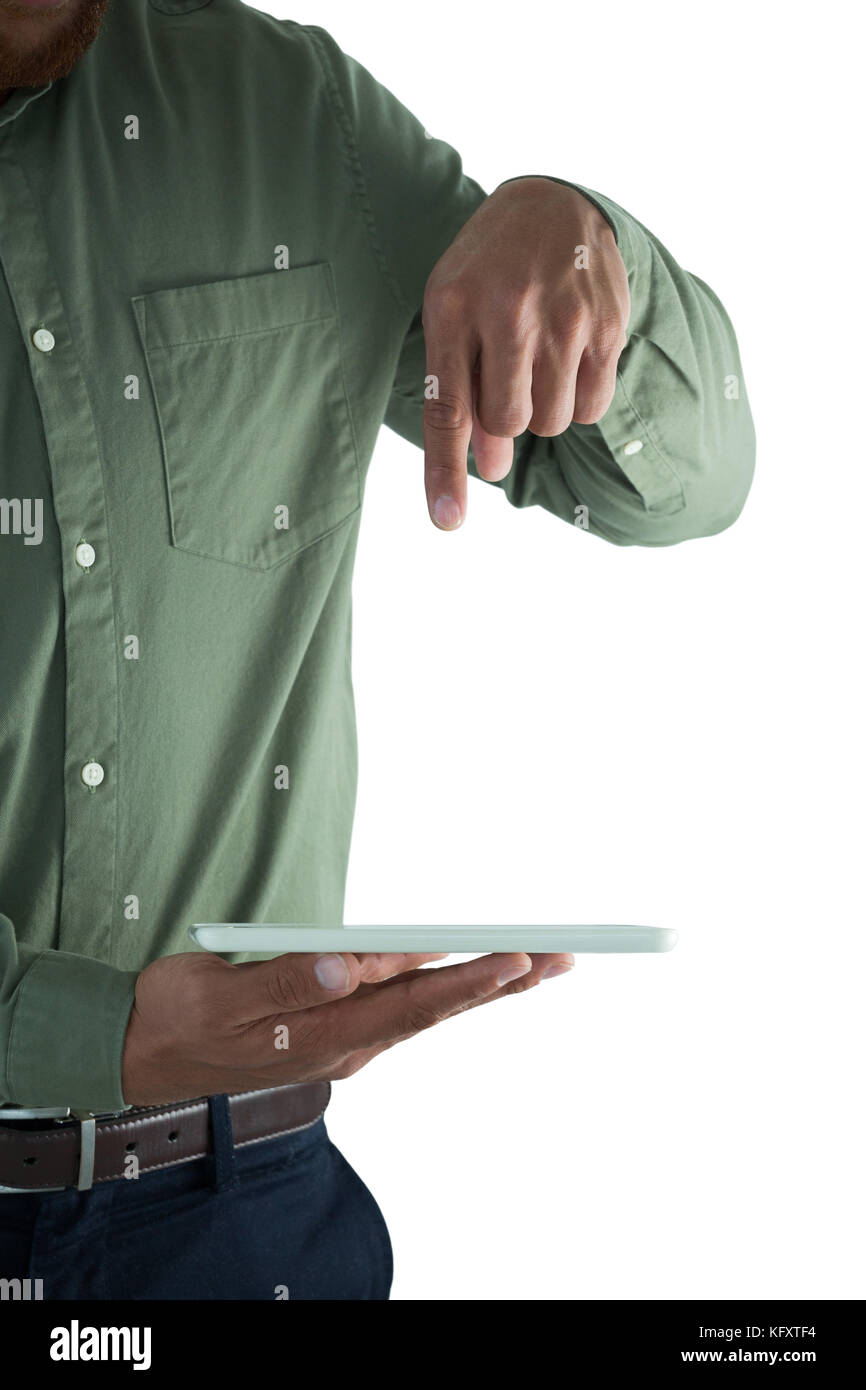 Mid-section of male executive pretending to use an invisible screen ...