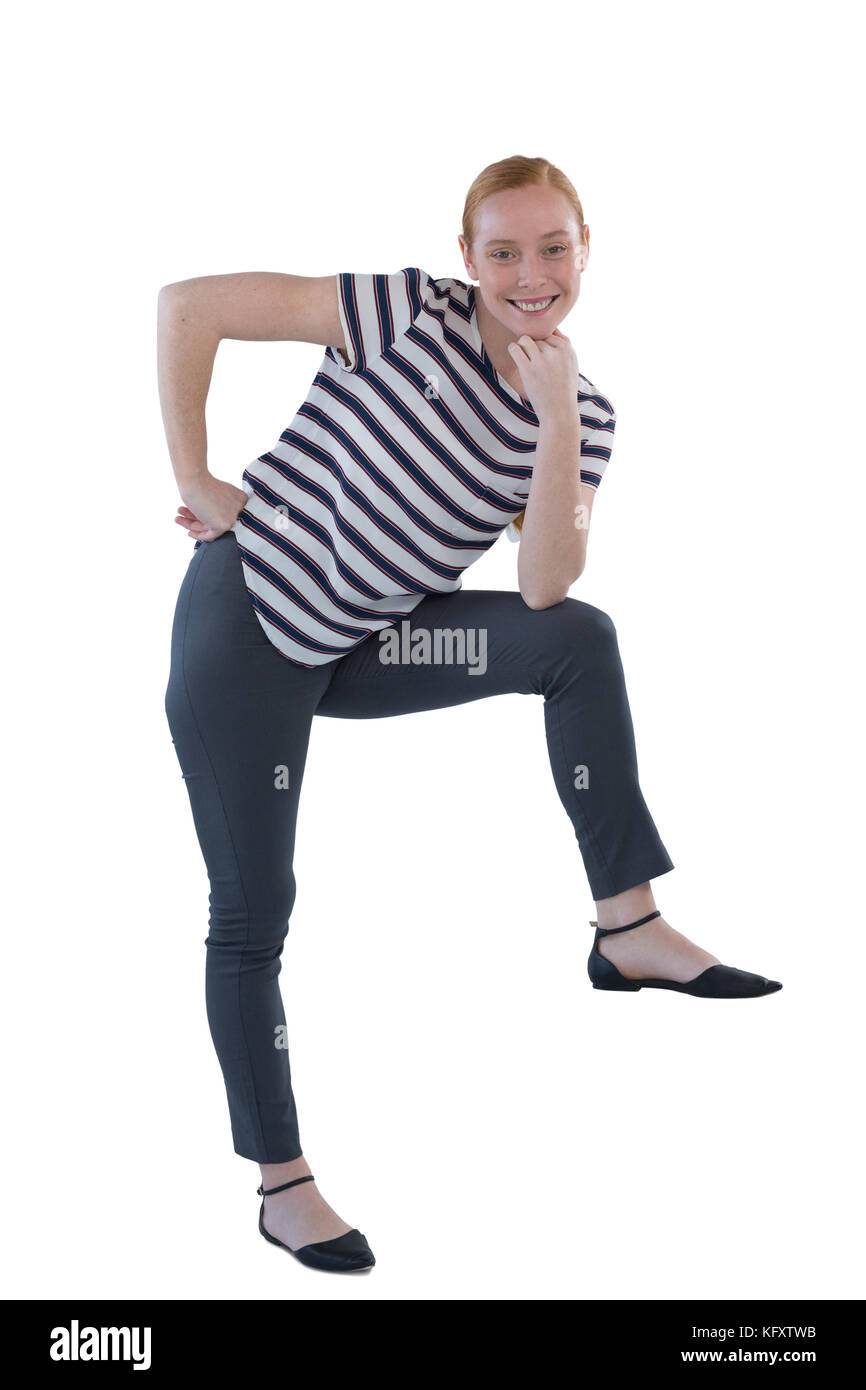 Happy woman posing against Cut Out Stock Images & Pictures - Alamy