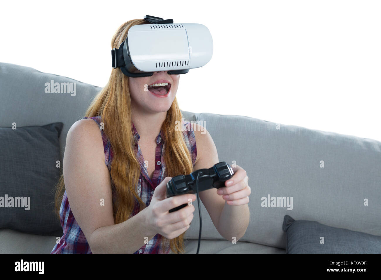Young woman playing video game with virtual reality headset Stock Photo ...