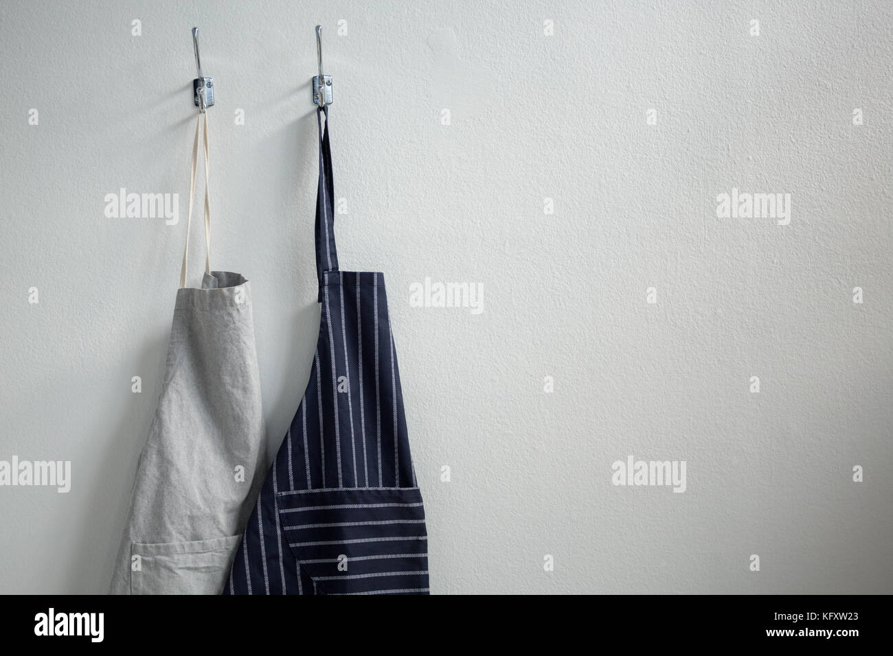 Striped aprons hi-res stock photography and images - Alamy