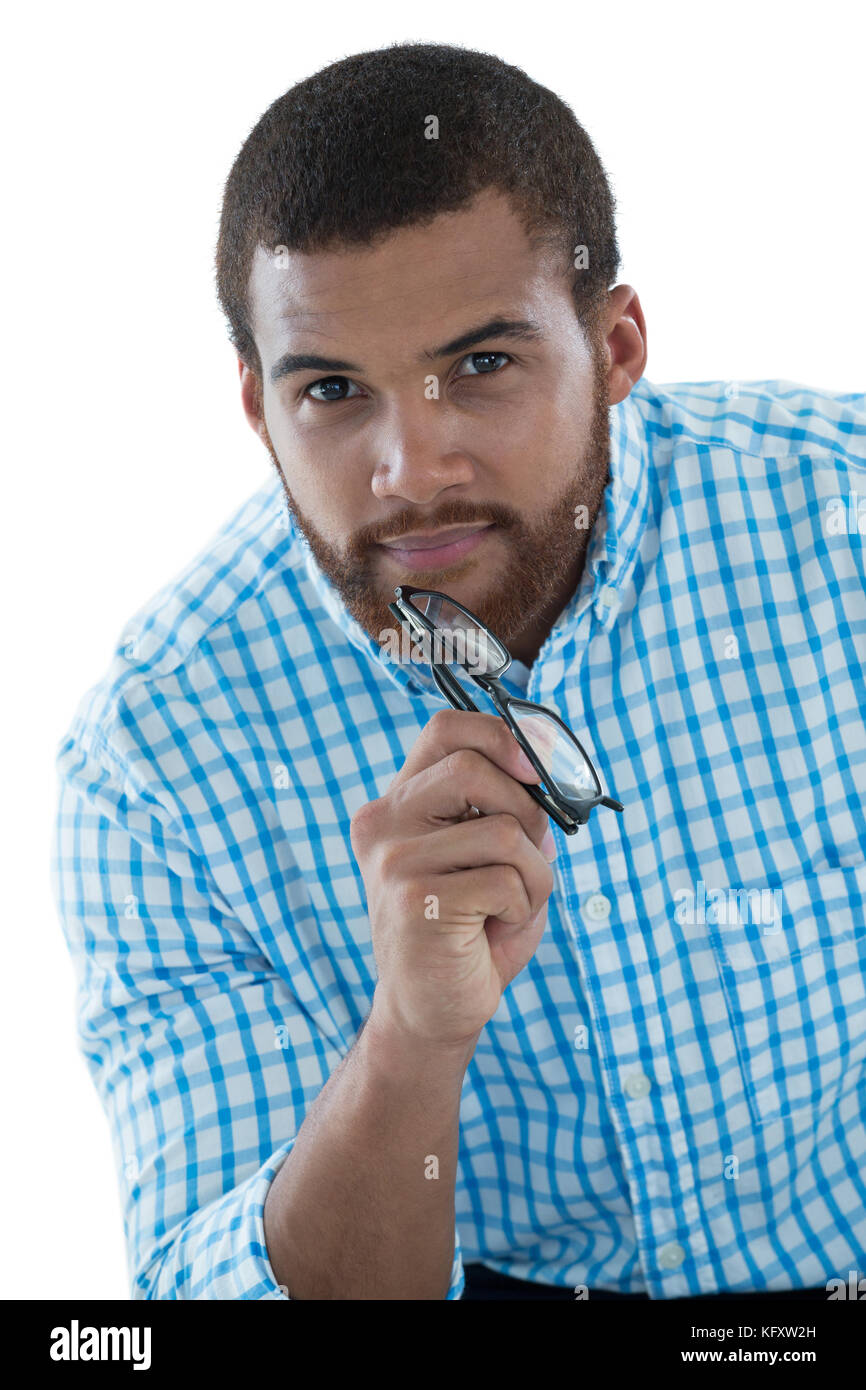 Young male executive posing against white background Stock Photo - Alamy