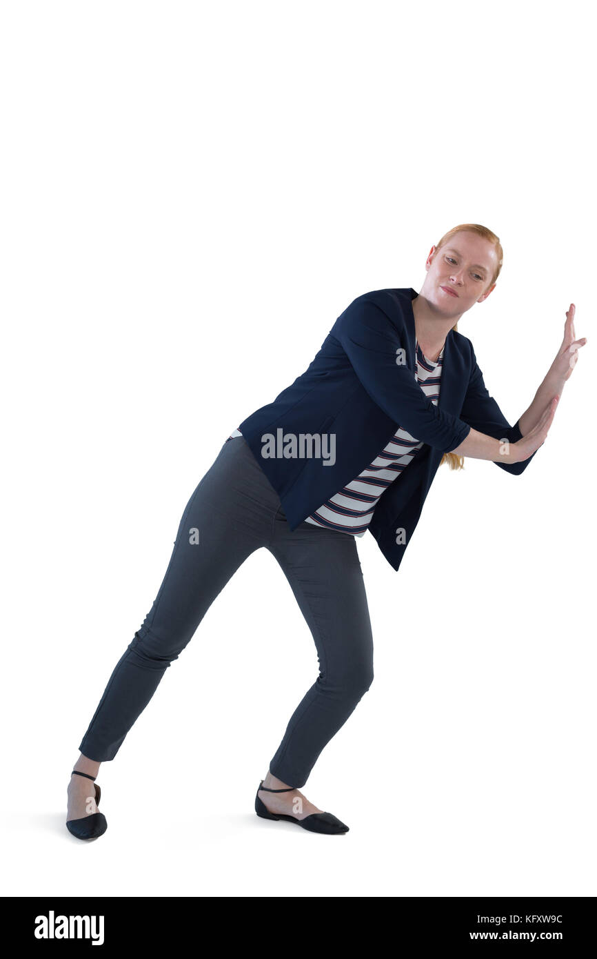 Beautiful woman pushing the side against white background Stock Photo ...