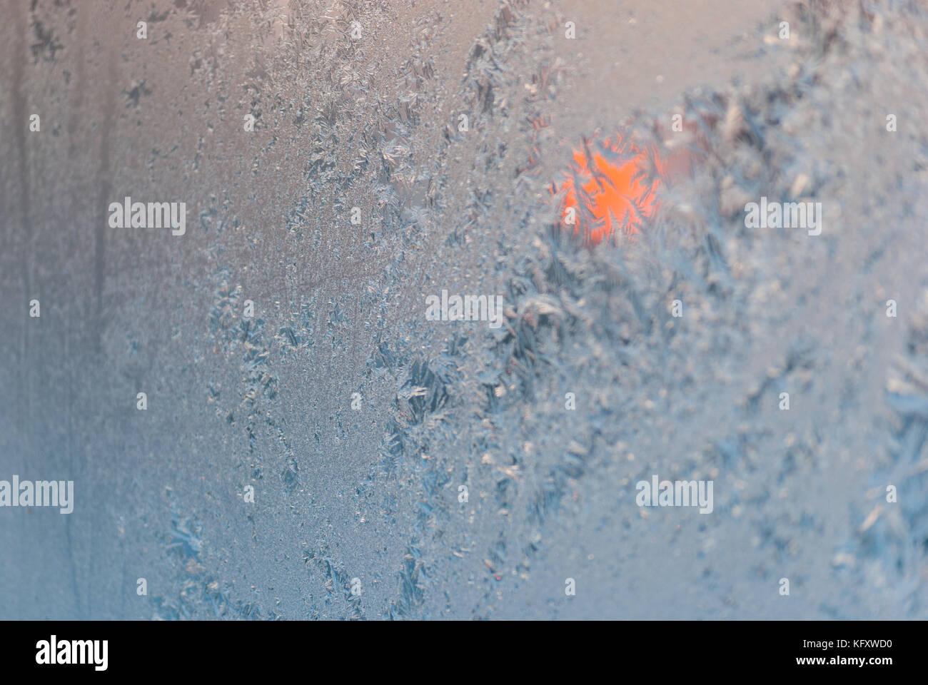 Frost on window at sunset Stock Photo - Alamy