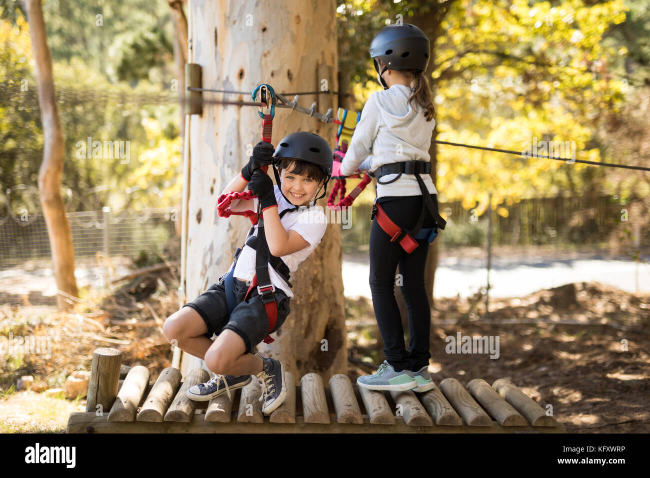 Child adventure park and zip line hi-res stock photography and images ...
