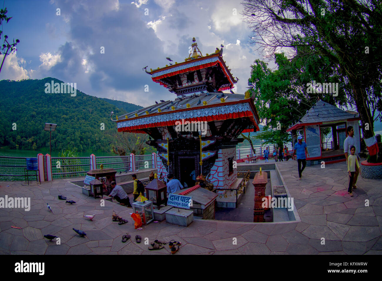 POKHARA, NEPAL - SEPTEMBER 04, 2017: Unidentified people walking around ...