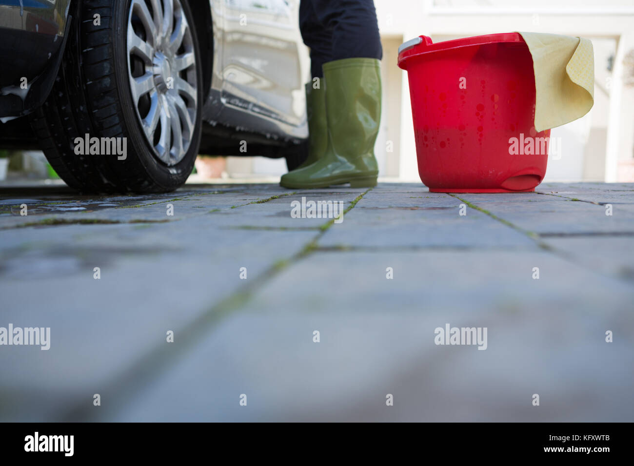 Male auto service staff washing a car Stock Photo - Alamy
