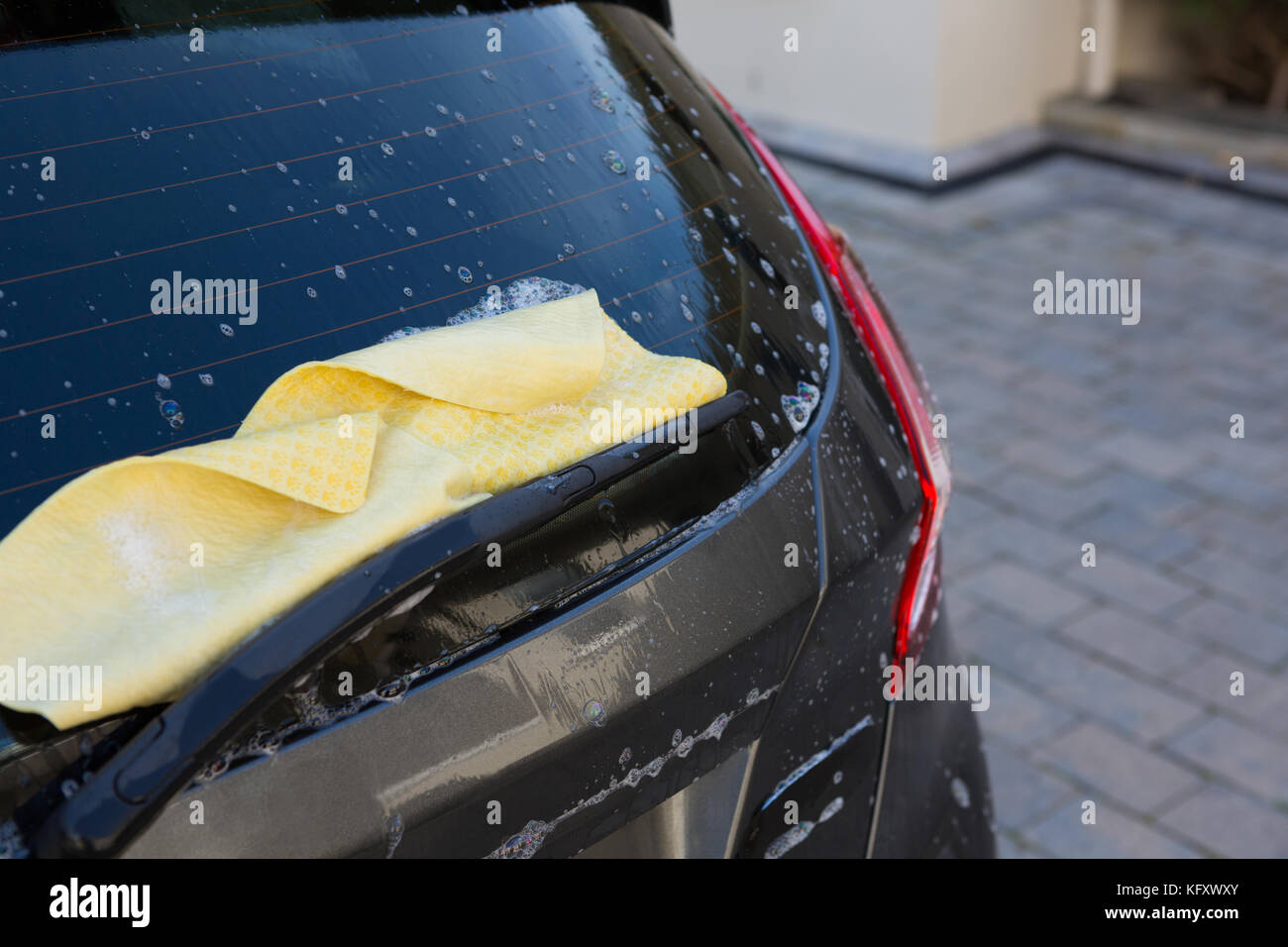 Half washed car with soap foam at outdoors Stock Photo - Alamy
