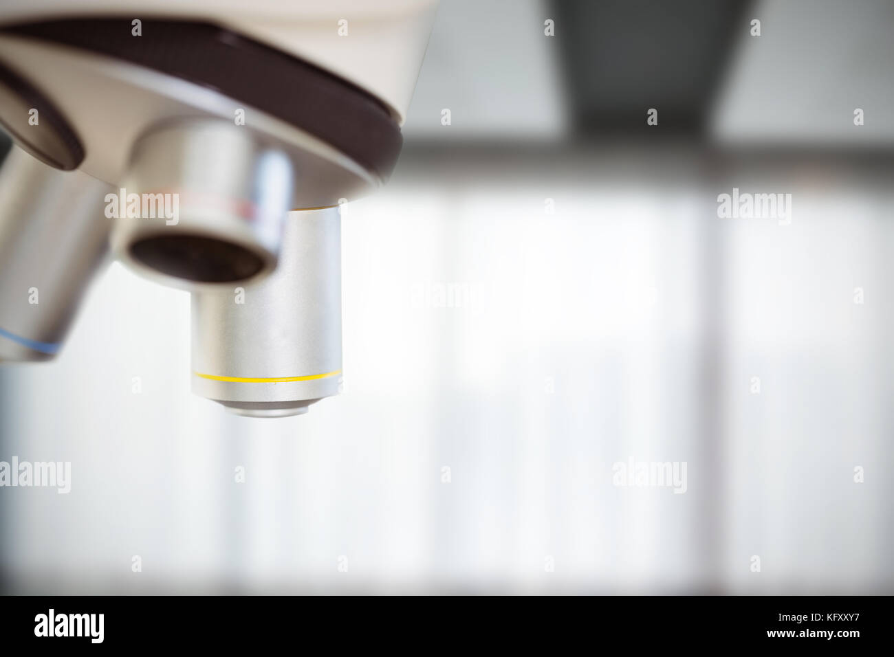 Microscope against digitally generated image of hall Stock Photo - Alamy