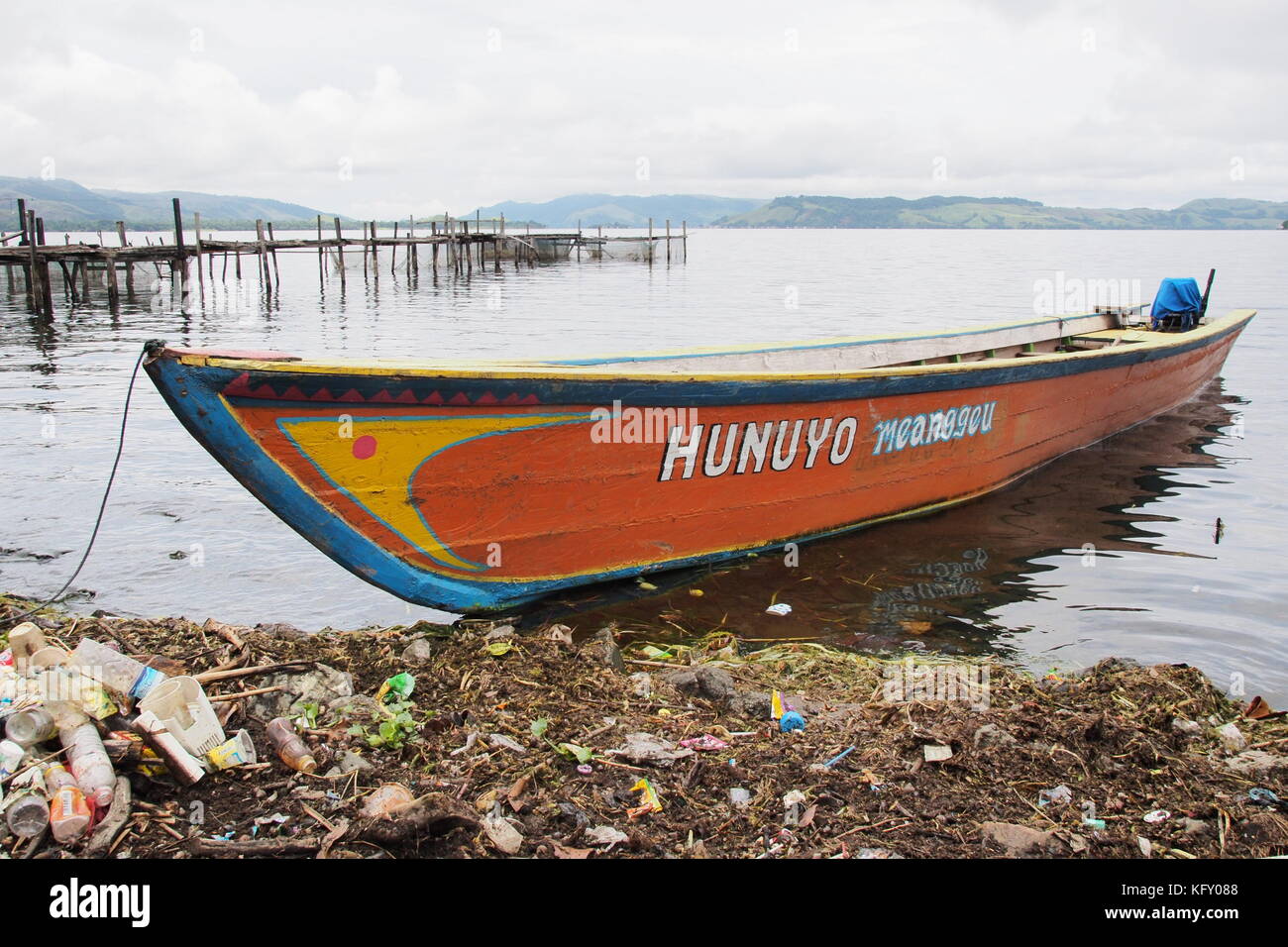 Wooden boat on the shore of Lake Sentani in West Papua Stock Photo - Alamy