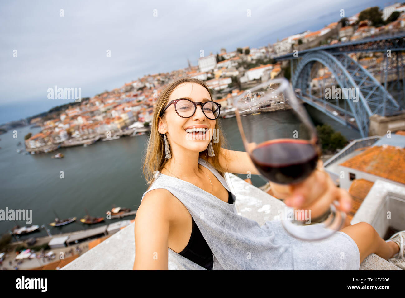 Woman with Porto wine in Portuguese Stock Photo - Alamy