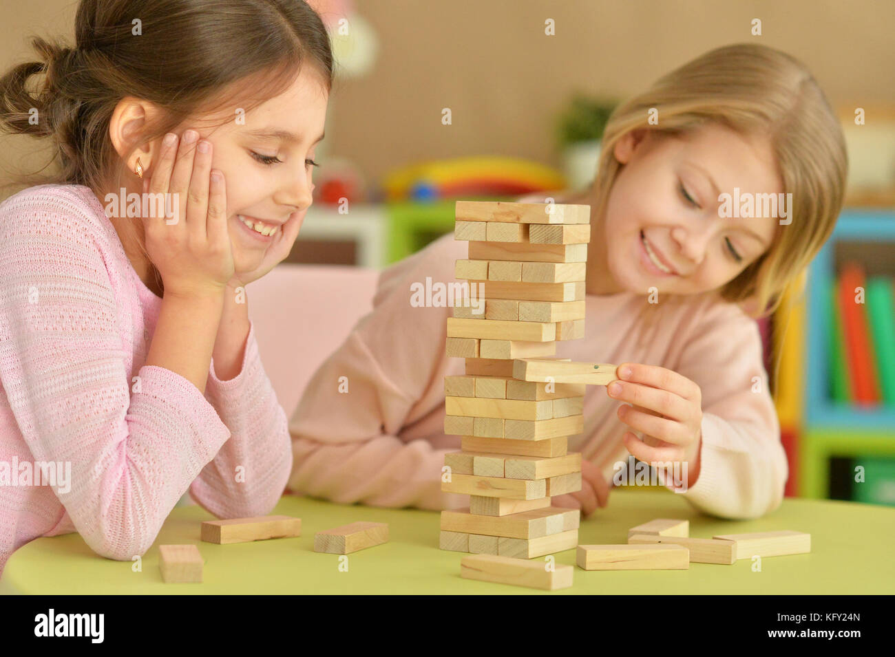 little girls playing with blocks Stock Photo - Alamy