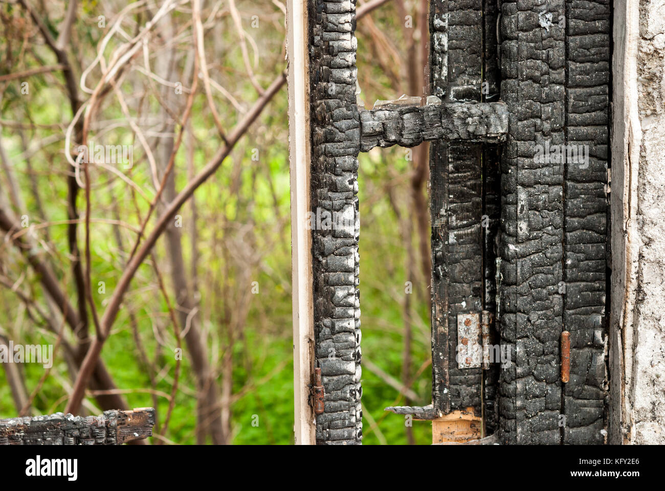 Window in burned house with green forest background Stock Photo - Alamy