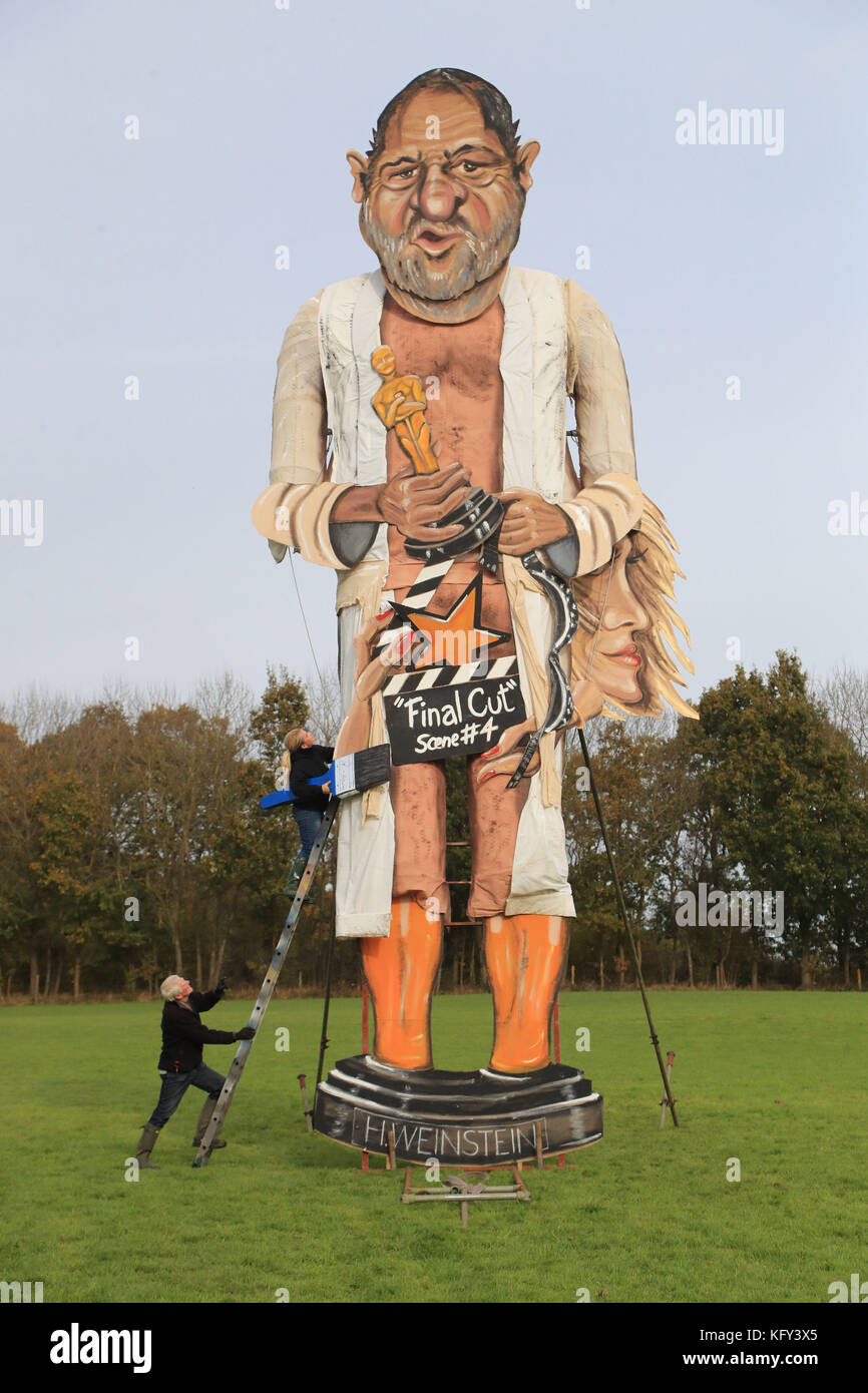 Artists Frank Shepherd and Andrea Deans put the finishing touches to ...