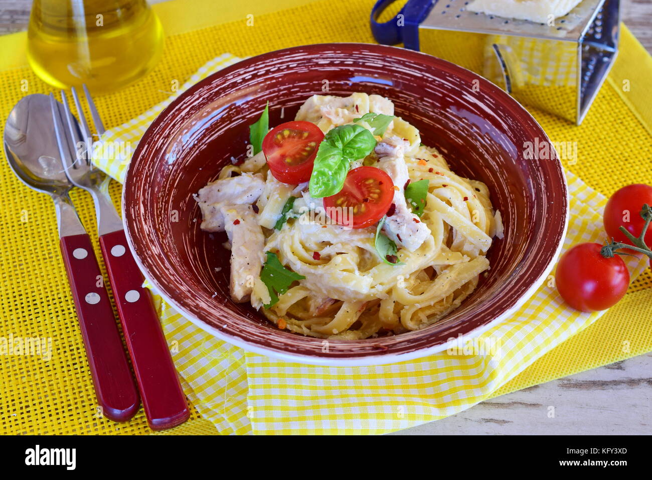 Pasta with chicken fillet, cream, onion Italian food Stock Photo - Alamy