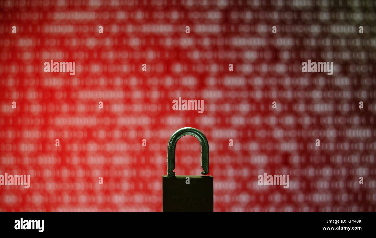 unlock lock in front of ransomware digital screen with numbers and ...