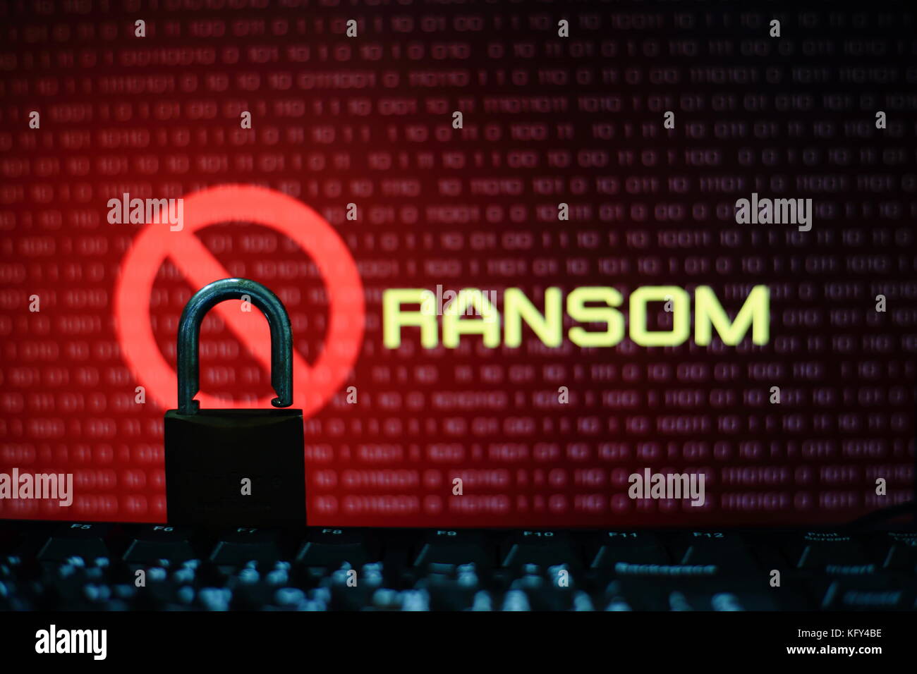 unlock lock in front of ransomware digital screen with numbers and ...