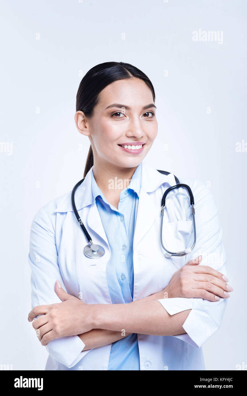 Female doctor folding arms hi-res stock photography and images - Alamy