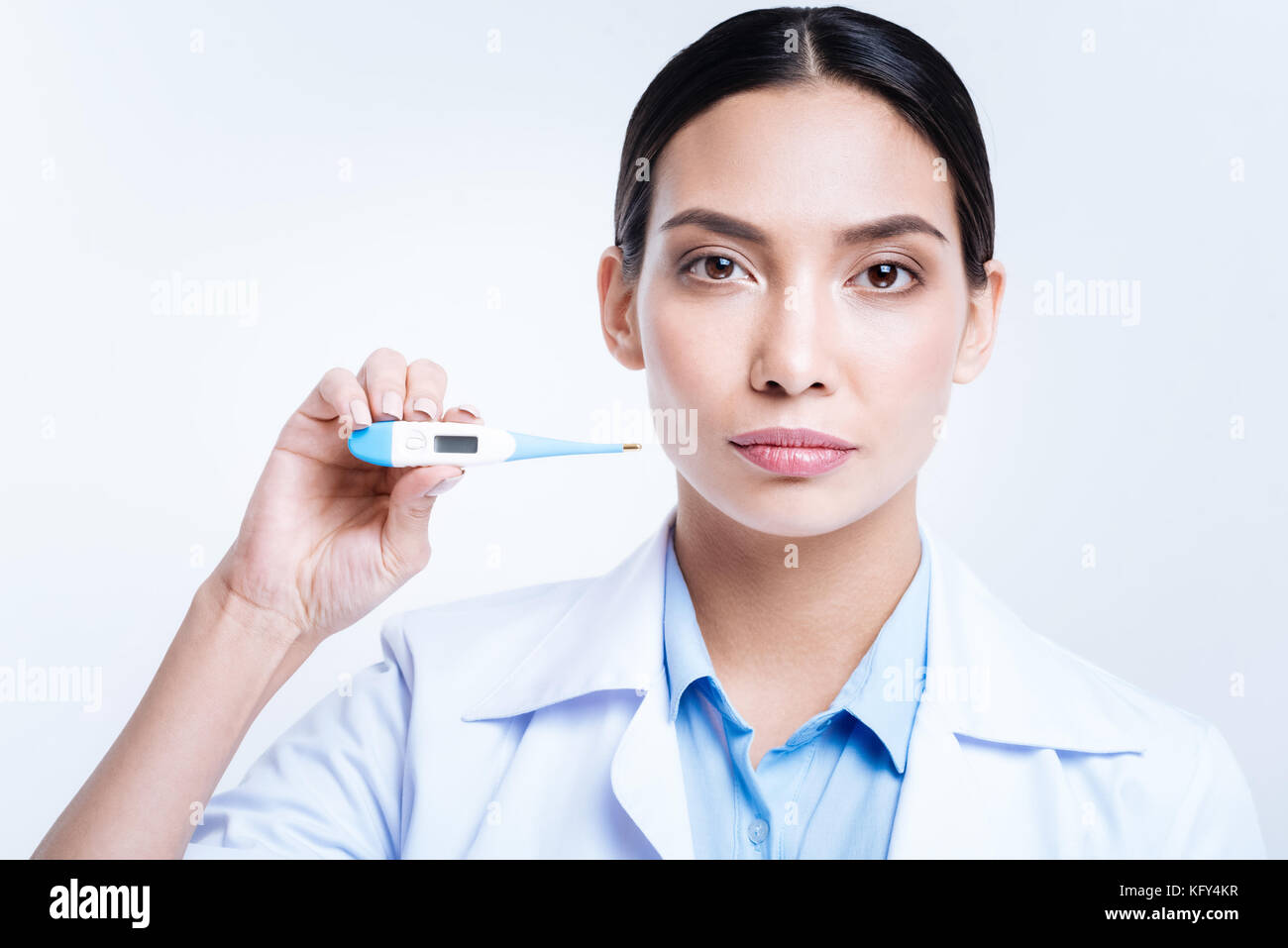 Nurse uniform thermometer hi-res stock photography and images - Alamy