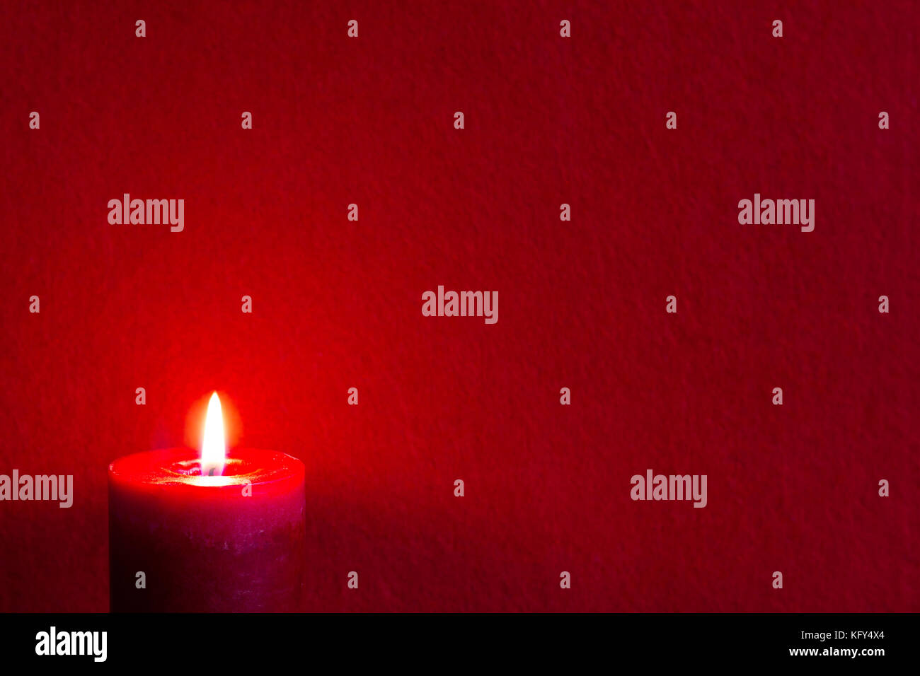 Christmas red textile background with candle Stock Photo - Alamy