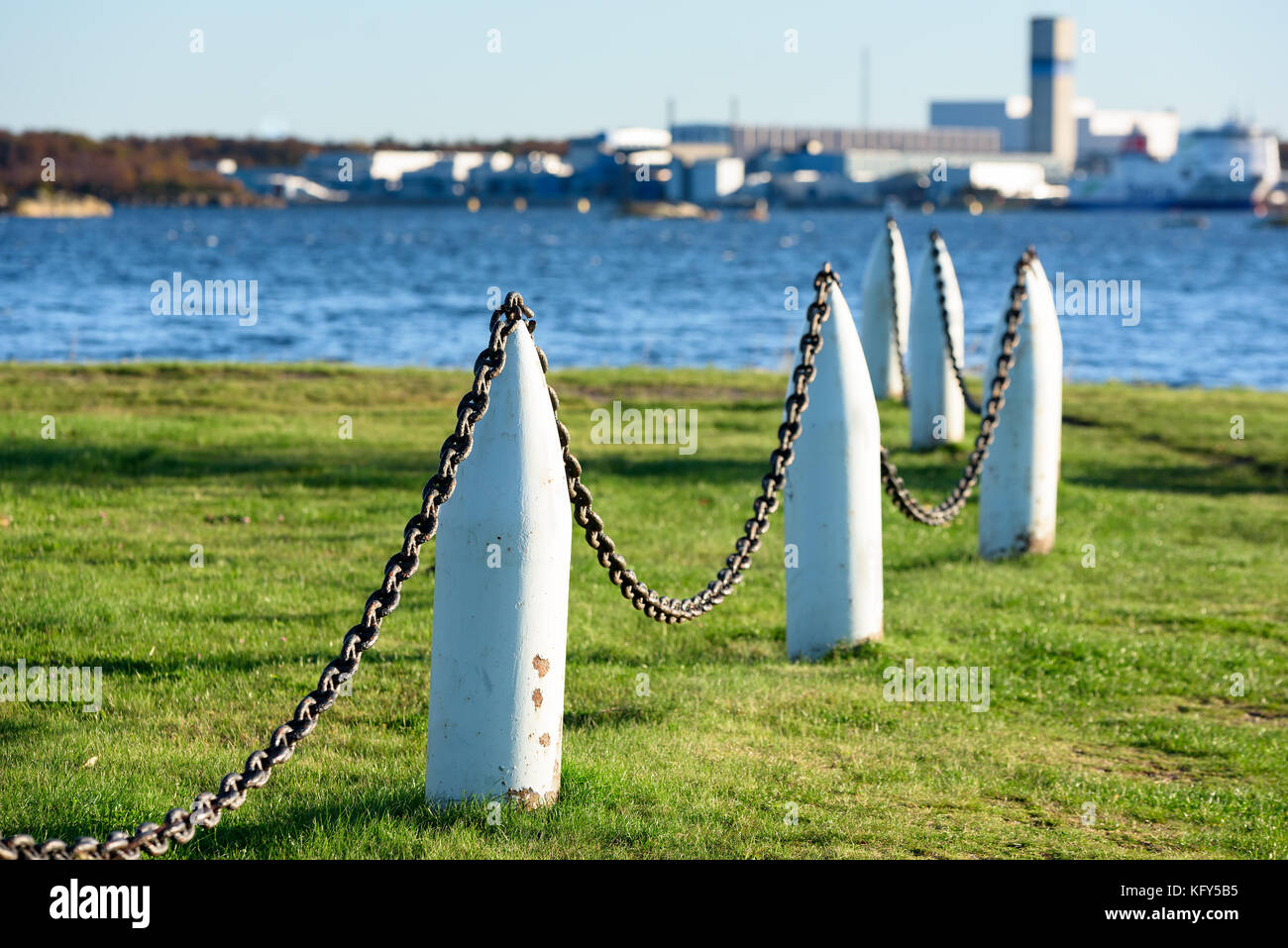 Fence made of iron chains hanging from canon projectiles Stock Photo ...