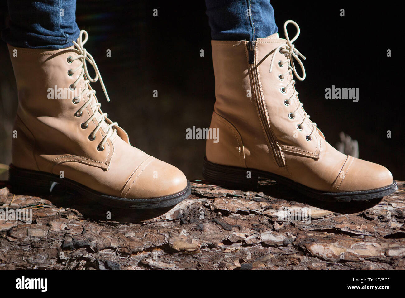 women's shoes against the background of the tree bark. Shoes, close-up ...