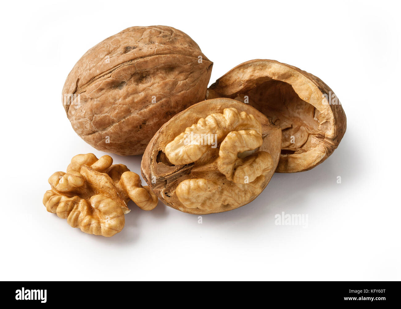 walnut and a cracked walnut isolated on the white background Stock ...