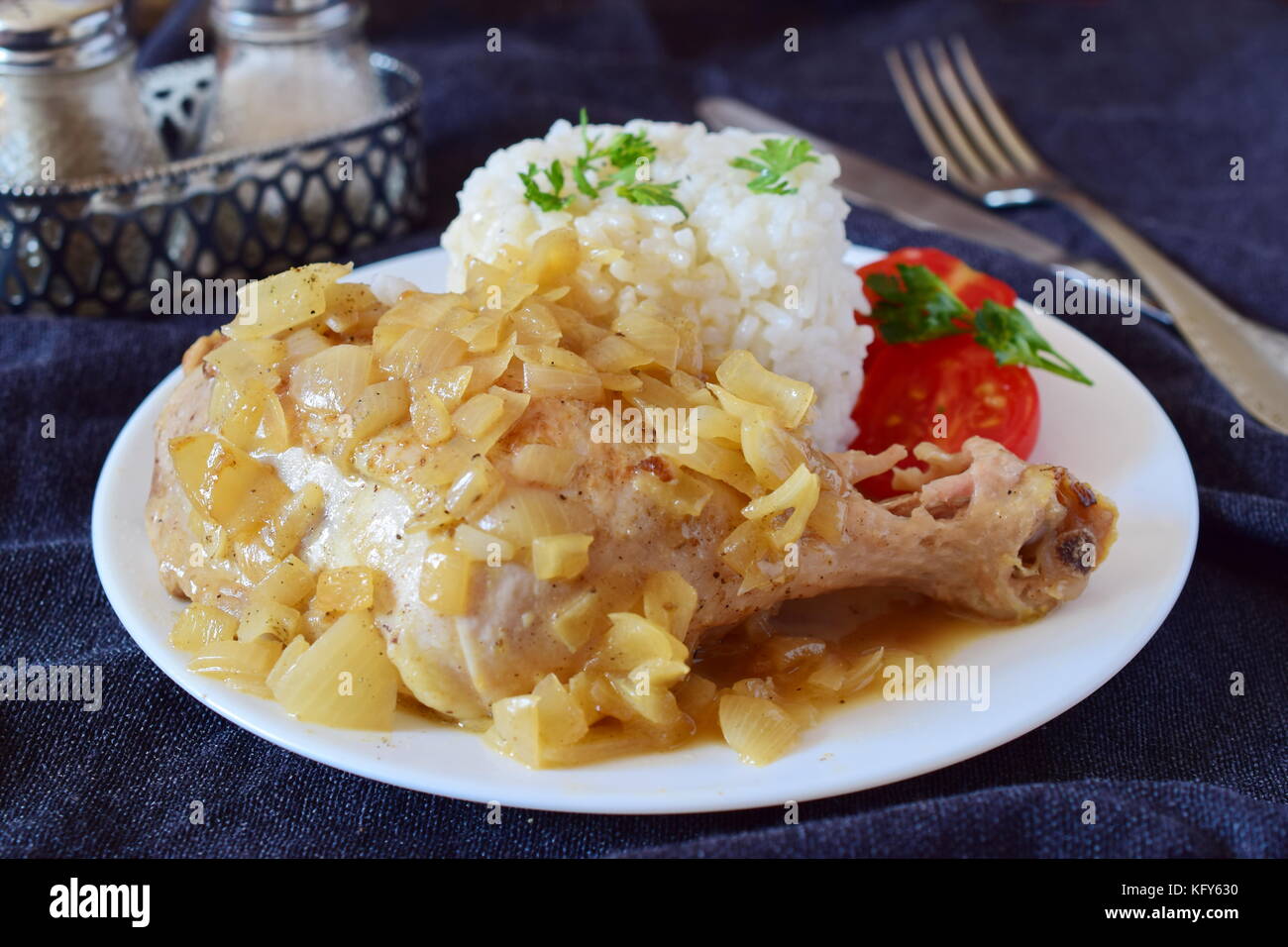 Chicken Yassa with onion sauce. African comfort food Stock Photo - Alamy