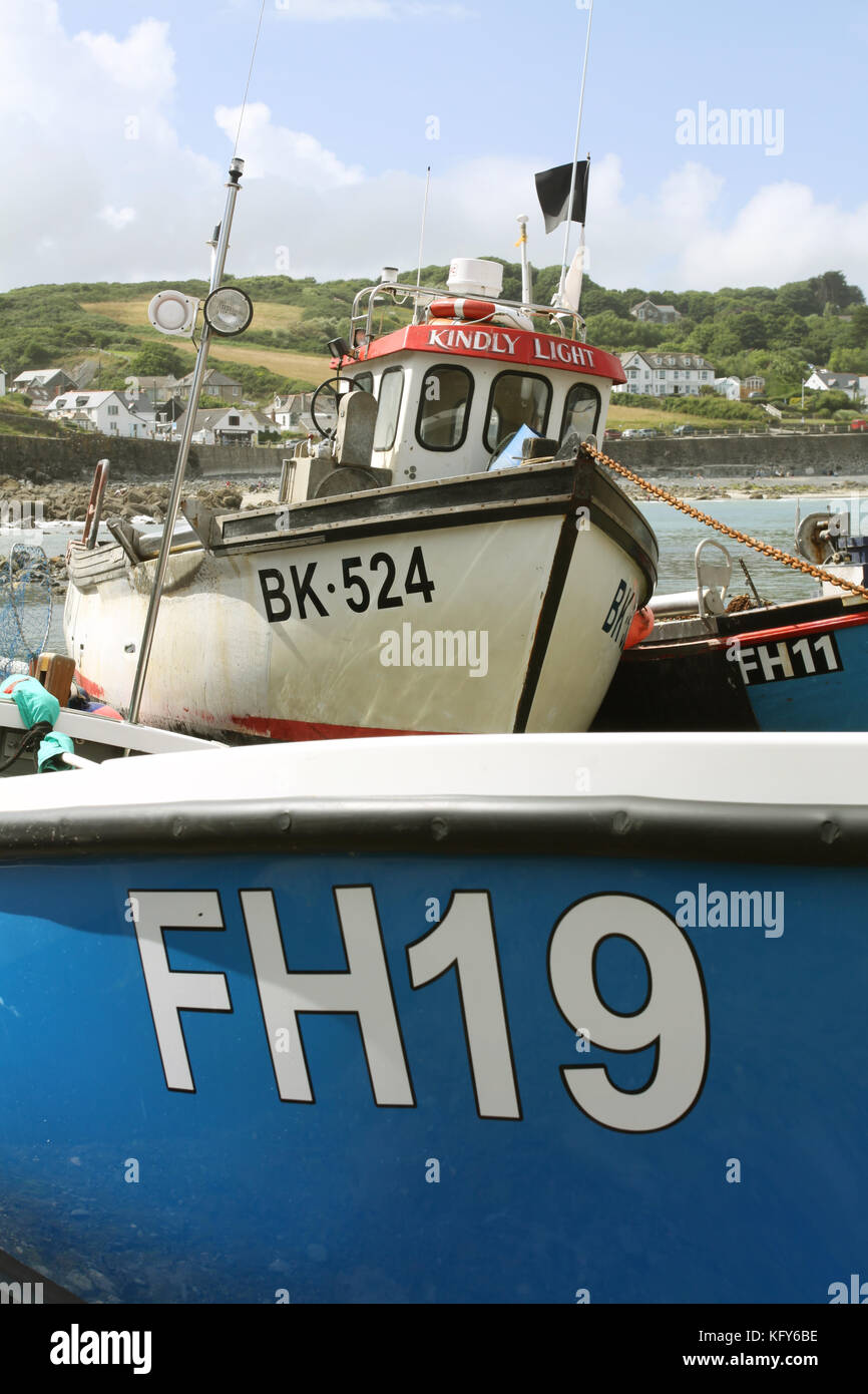 Fishing boats at low tide, Coverack Cove, Cornwall, England Stock Photo ...